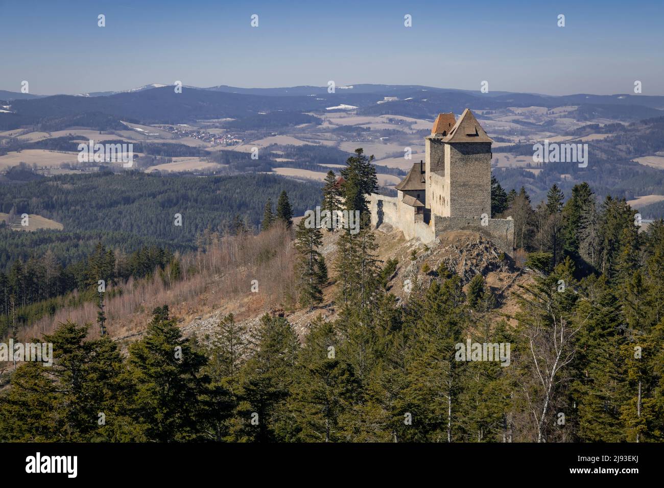 The Gothic castle Kasperk rises on a rocky peak. It is the highest ...