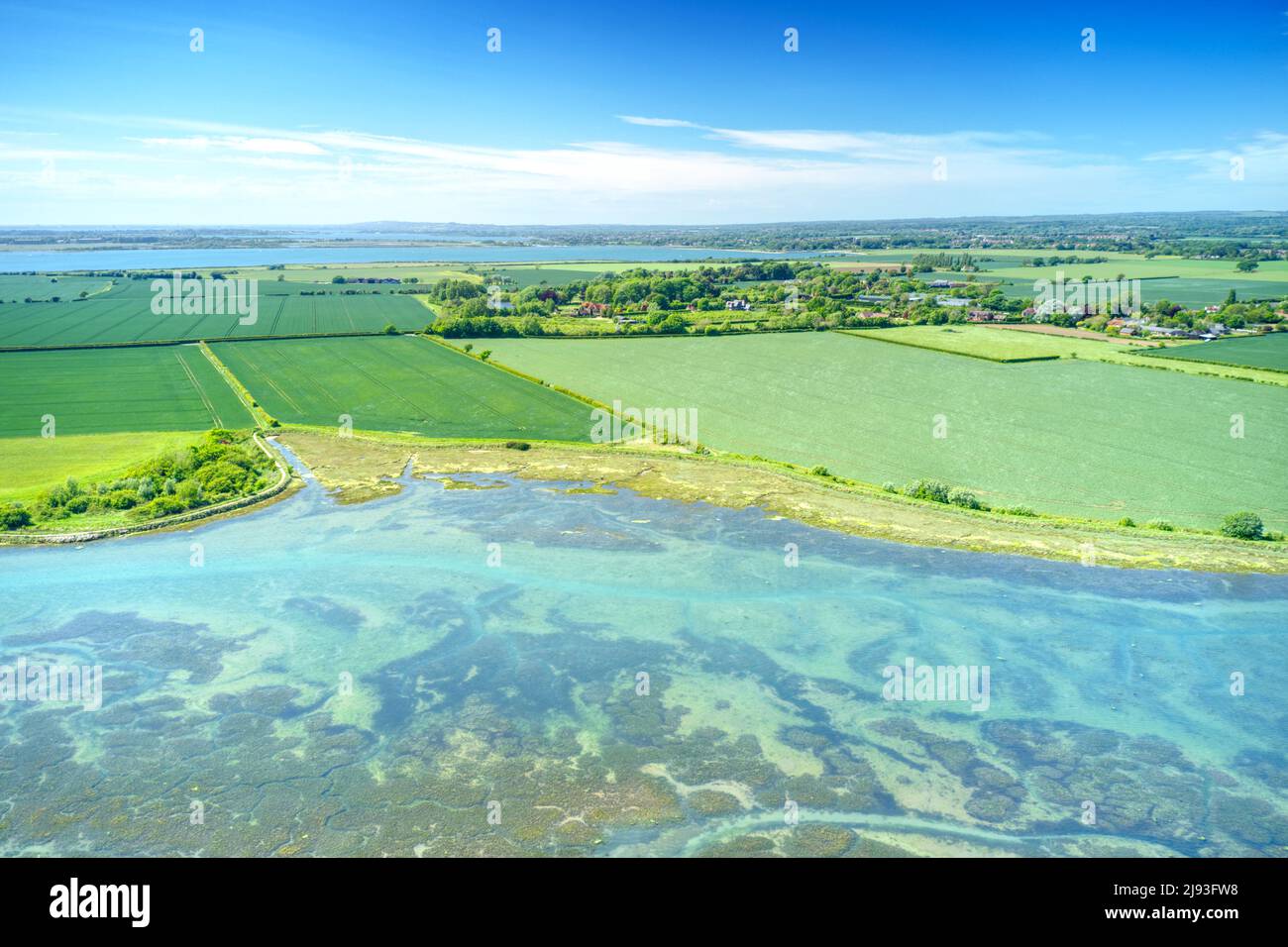 Aerial view from Bosham estuary across the countryside of West Sussex ...