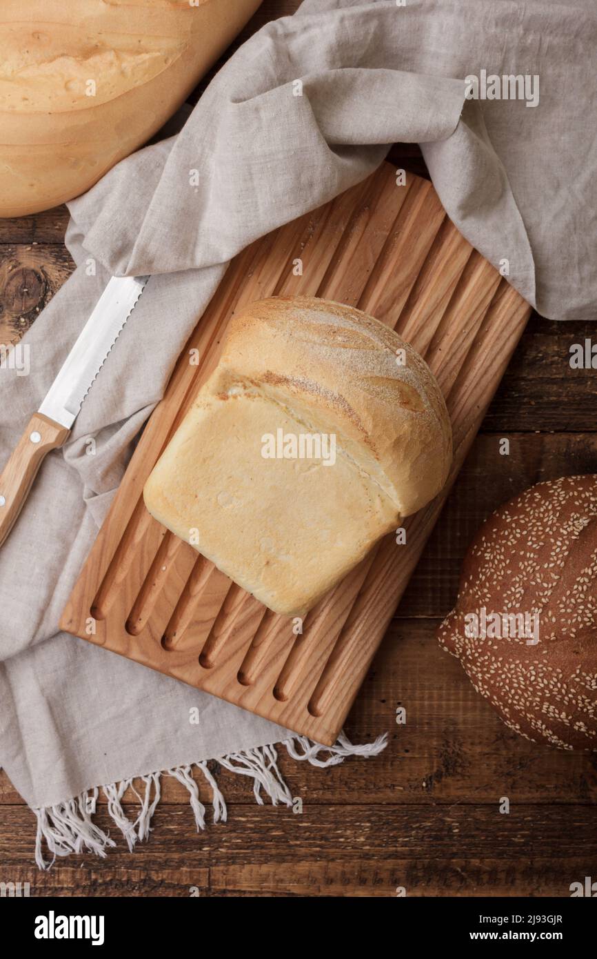 Natural bread loaf on wooden background Stock Photo - Alamy