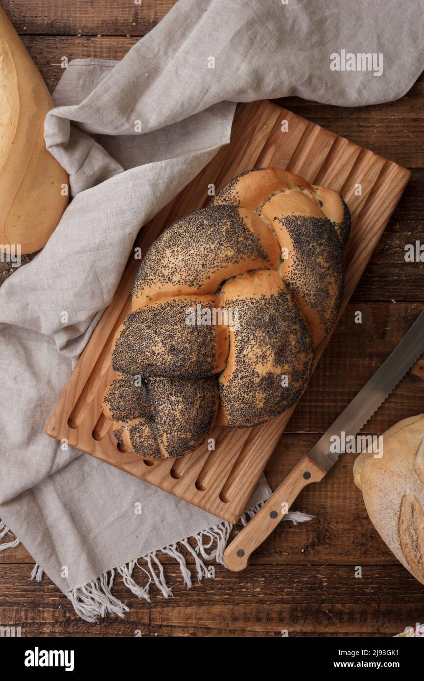 Natural bread loaf on wooden background Stock Photo - Alamy