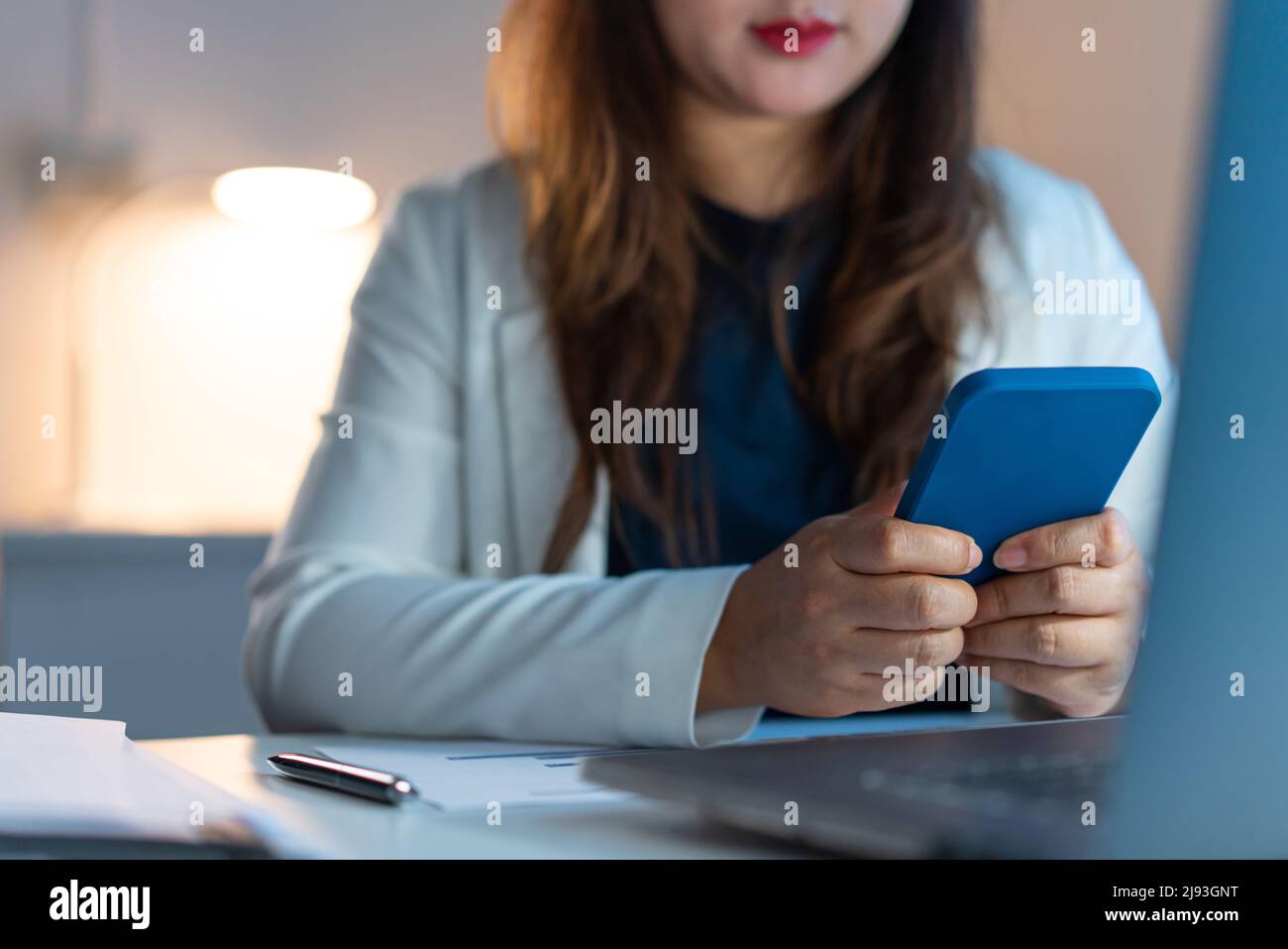 Overwork Concept The female office employee who wears white blazer ...