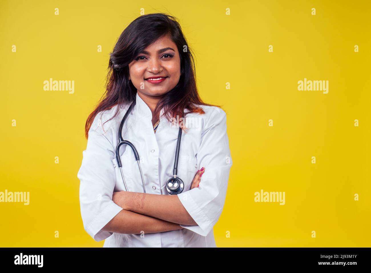 Female indian young and beautiful blond woman gynecologist doctor using ...