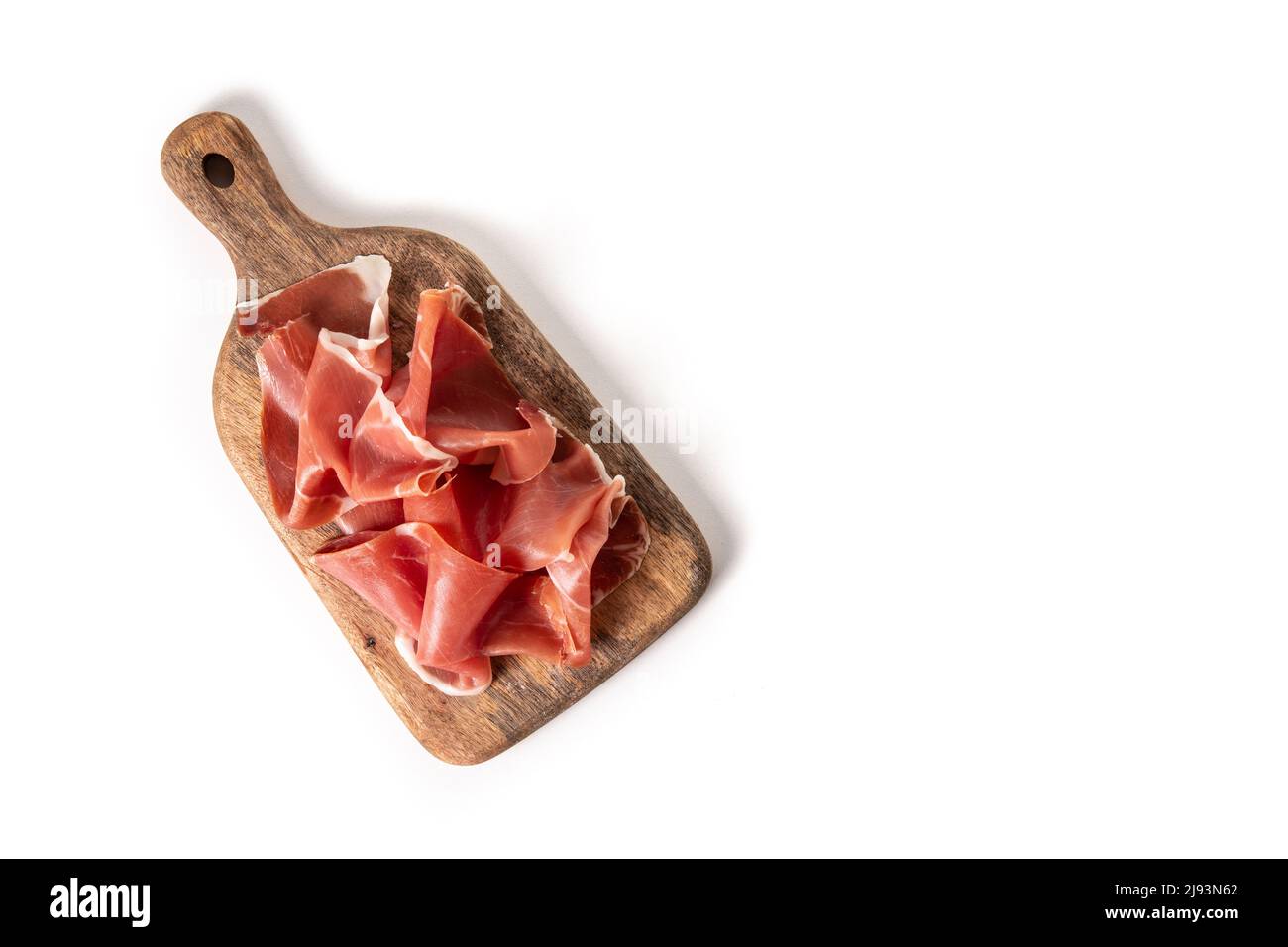 Spanish serrano ham isolated on white background Stock Photo - Alamy