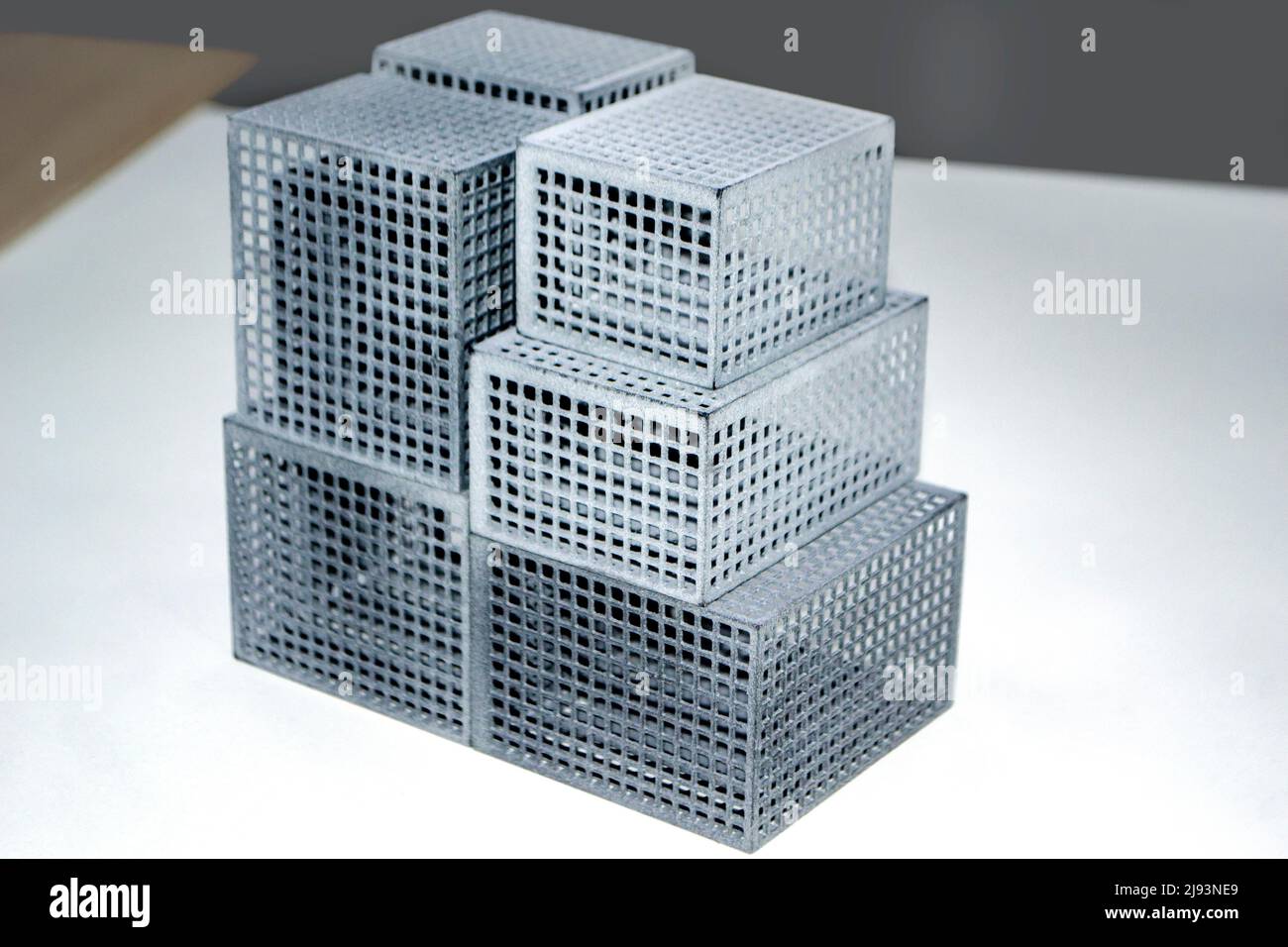 Models printed on 3D printer. Gray plastic objects printed on 3D ...