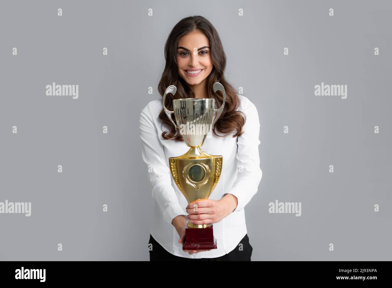 Female gold trophy hi-res stock photography and images - Alamy