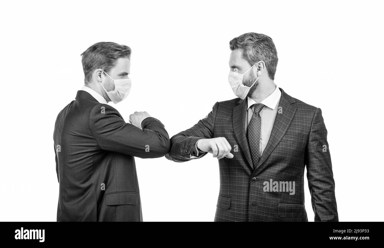 businessmen not shaking hands. social distancing during coronavirus ...