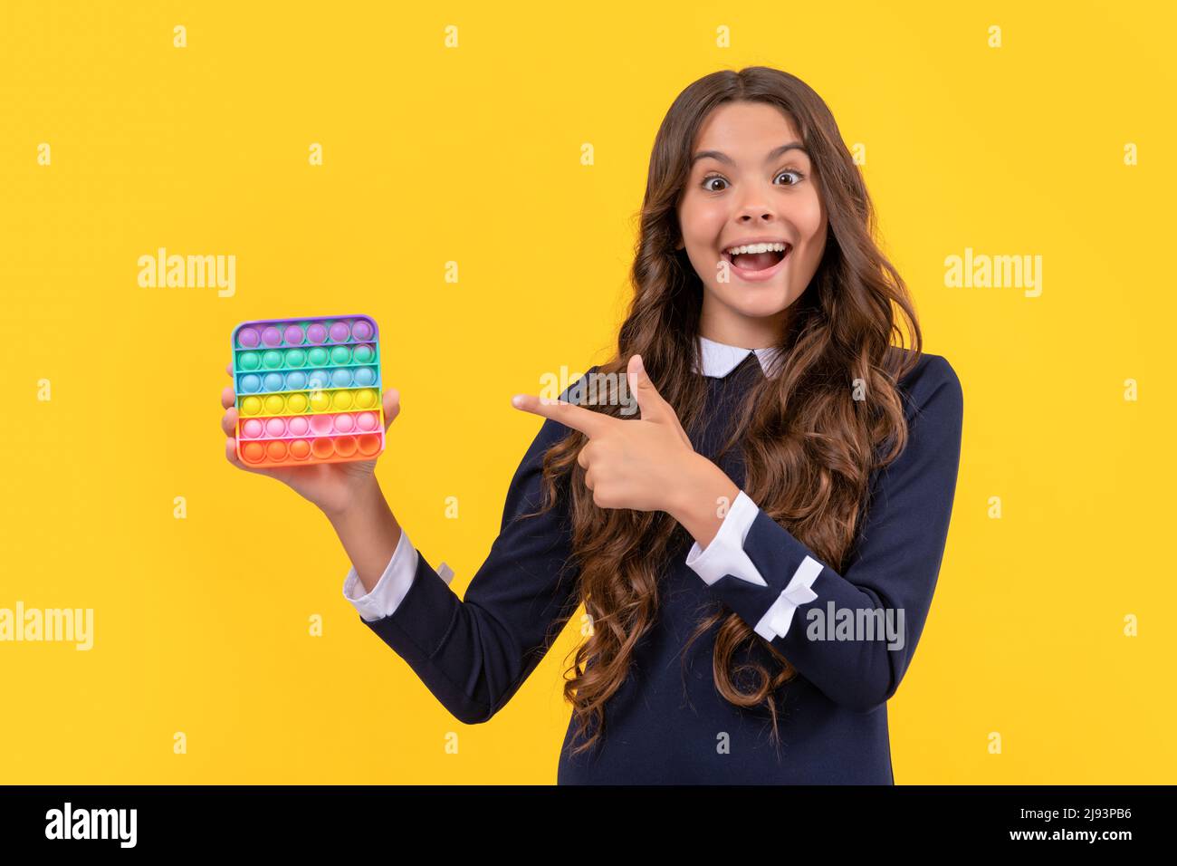 happy girl point finger on finger game. kid popping anti stress bubble ...