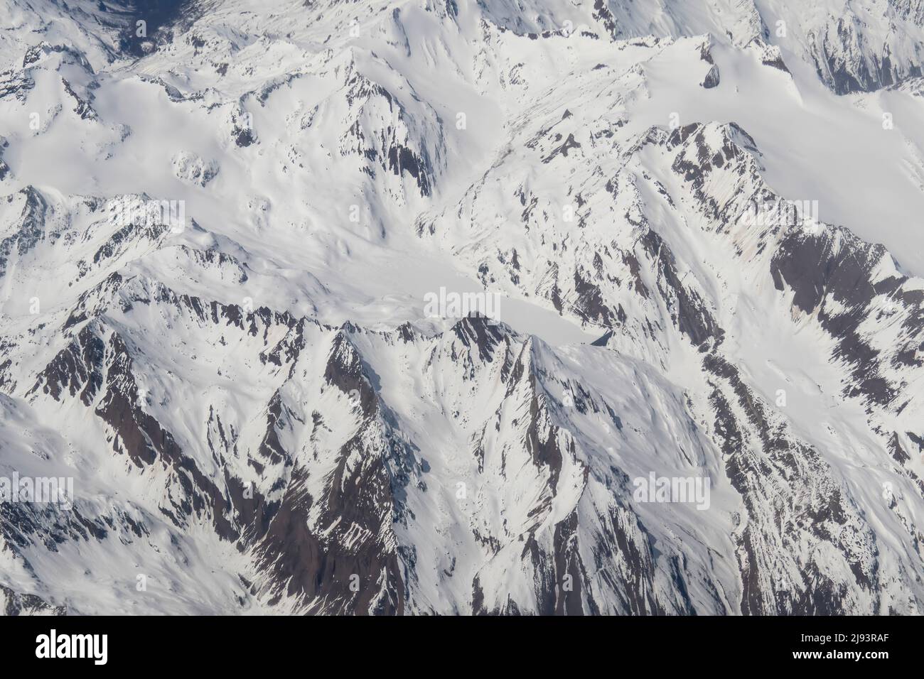 Aerial view of the snow covered Alps Stock Photo - Alamy