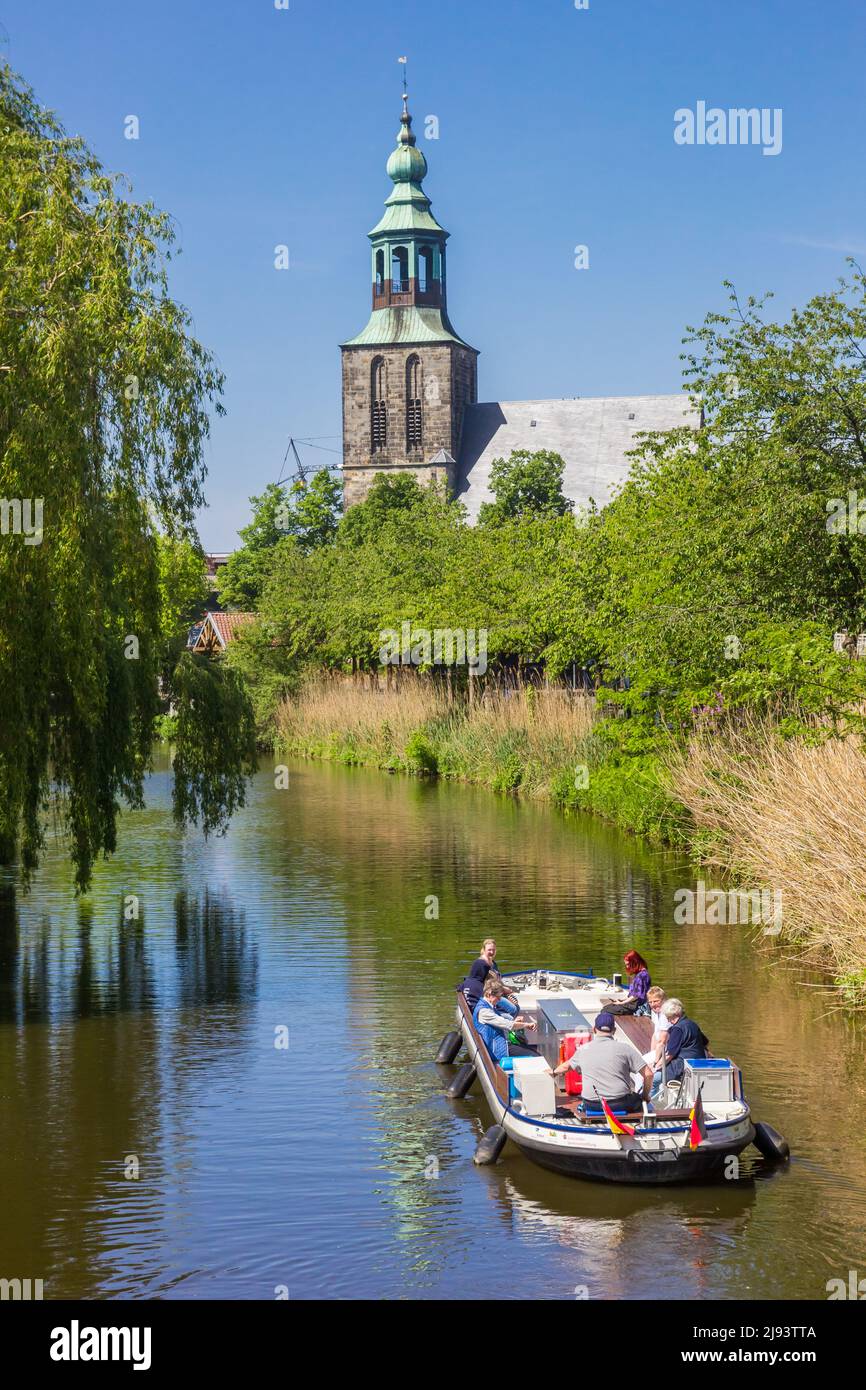 Tourists taking a cruise on the Vechte river in Nordhorn, Germany Stock ...