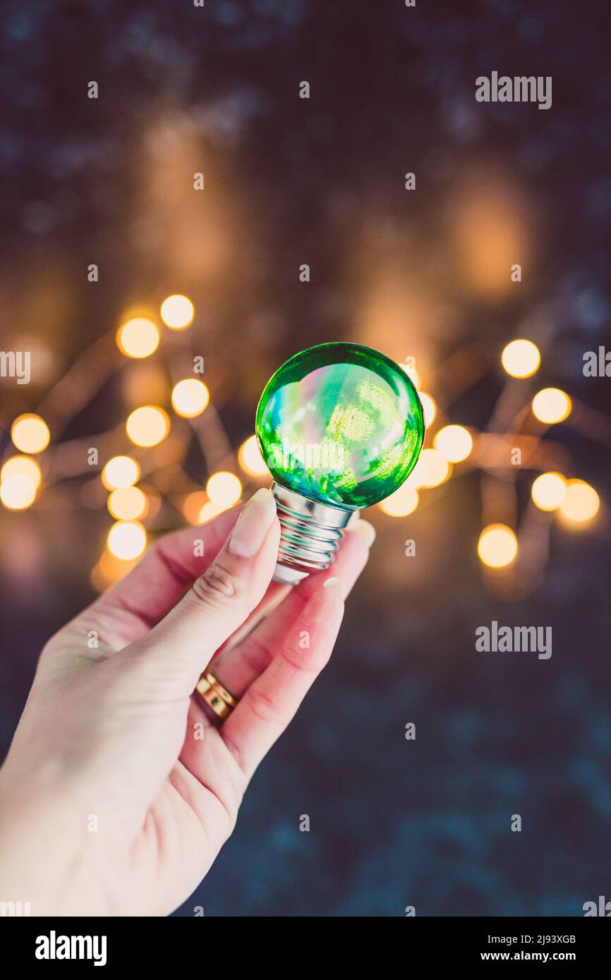 green economy and ideas for the environment, hand showing green light ...