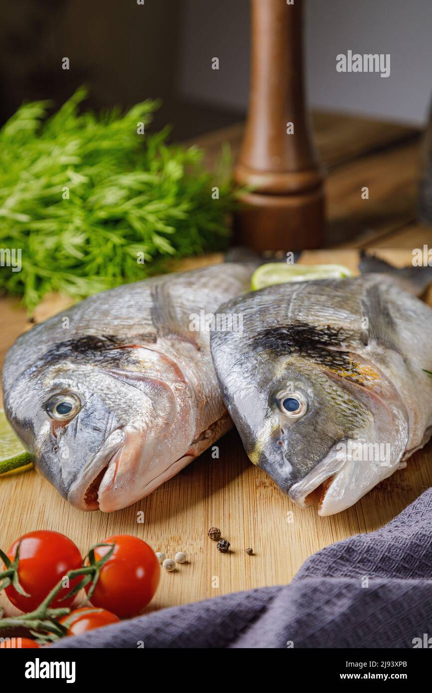 Fish on wooden tables hi-res stock photography and images - Alamy