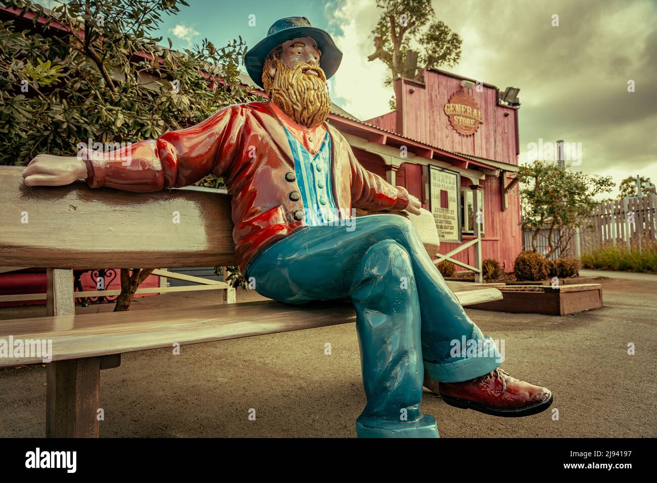 Gold Coast, Queensland, Australia - Old prospector statue sitting on a ...