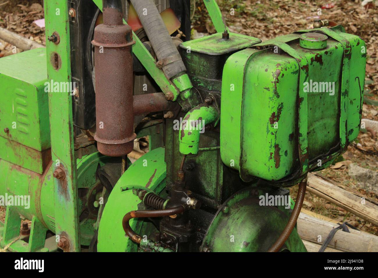 Large green colour electrical power generator. Electrical generator ...