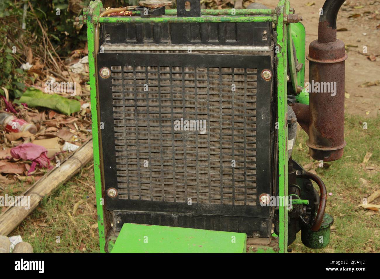 Large green colour electrical power generator. Electrical generator ...