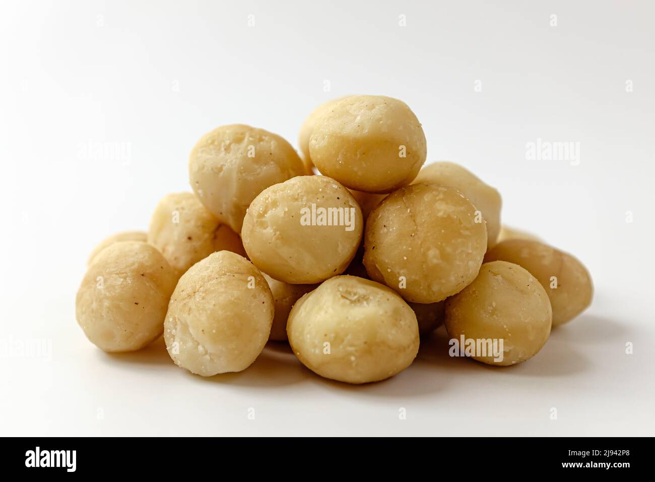 Macadamia on a white background Stock Photo - Alamy