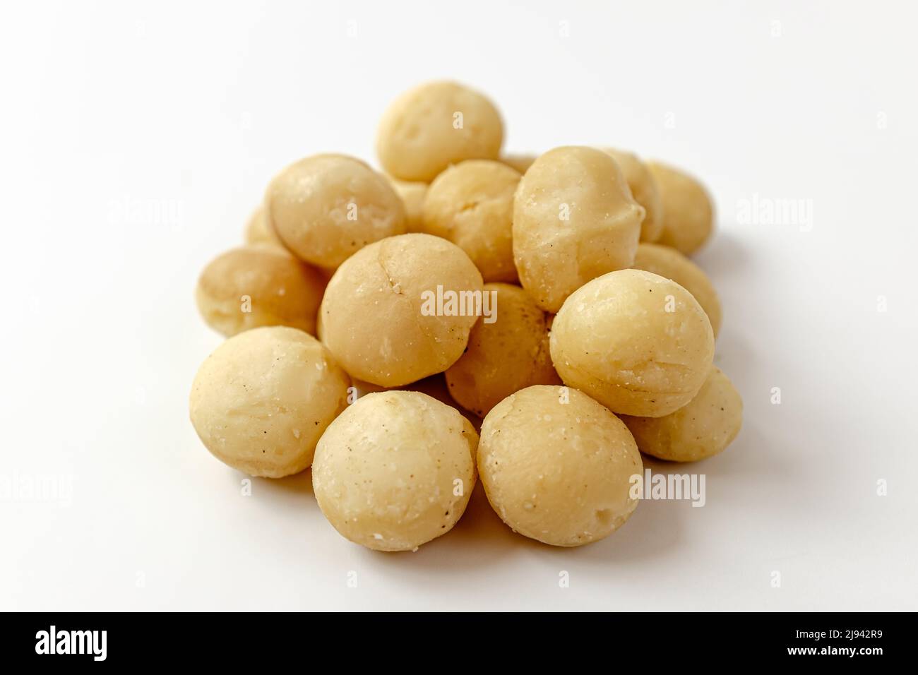 Macadamia on a white background Stock Photo - Alamy