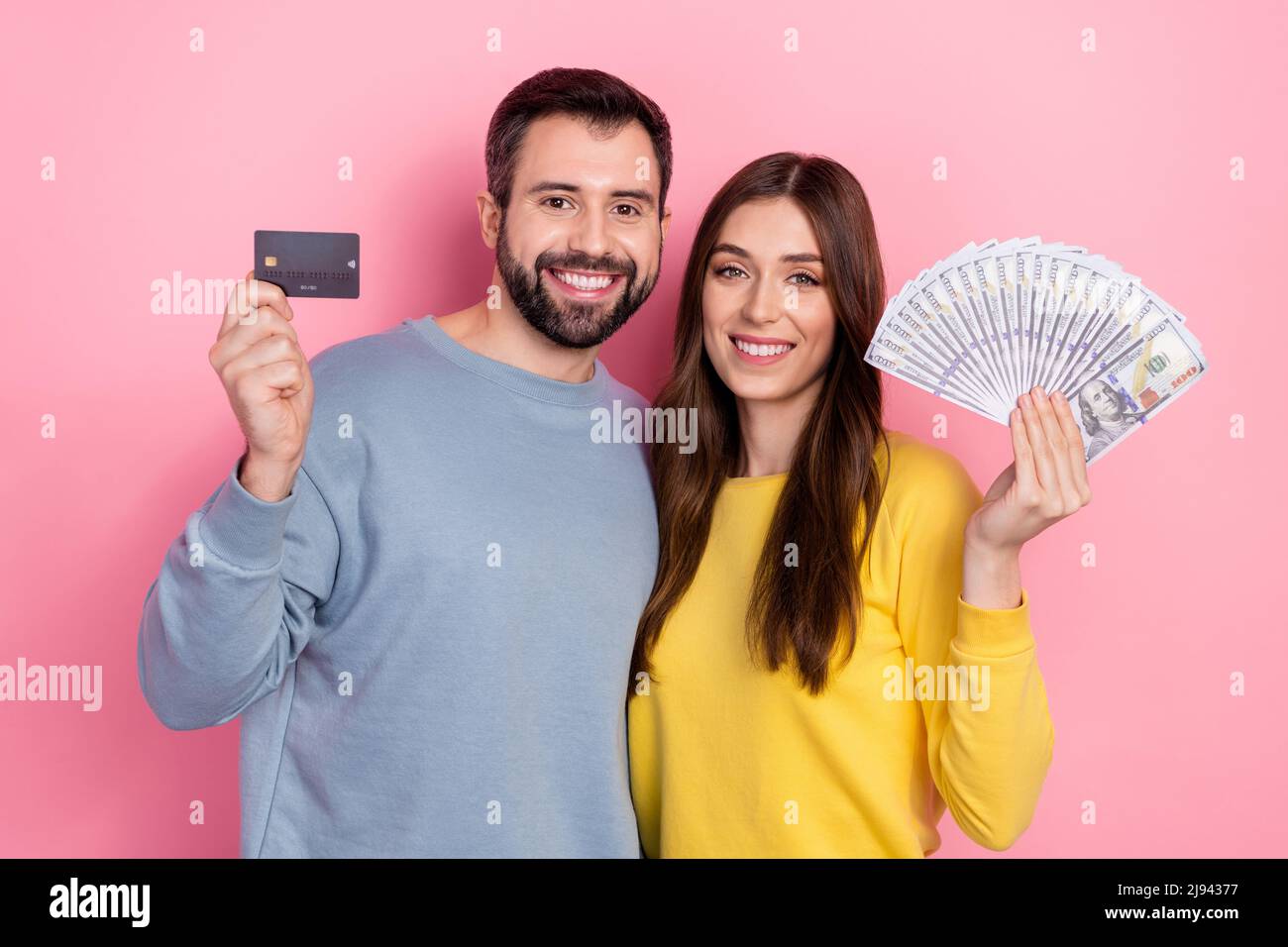 Portrait of beautiful handsome friends friendship holding fan cash fund ...
