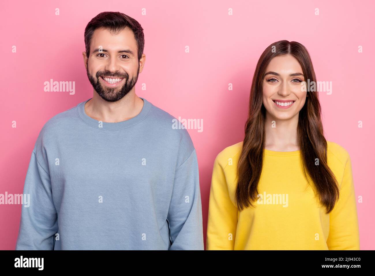 Portrait of two positive cheerful people toothy beaming smile look ...