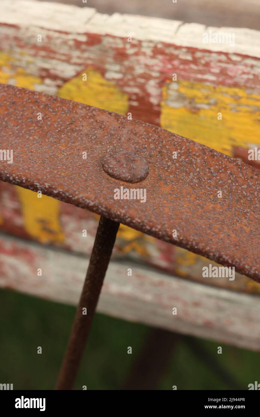 Rusty old farm wagon wheel with lots of rusted iron Stock Photo - Alamy