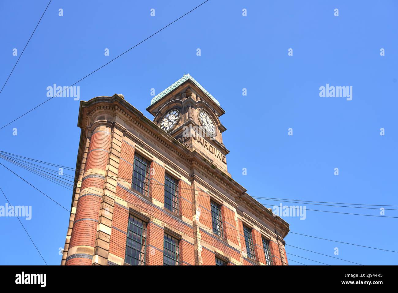 Clock tower on an old lace mill building in Draycott, Derbyshire, UK ...