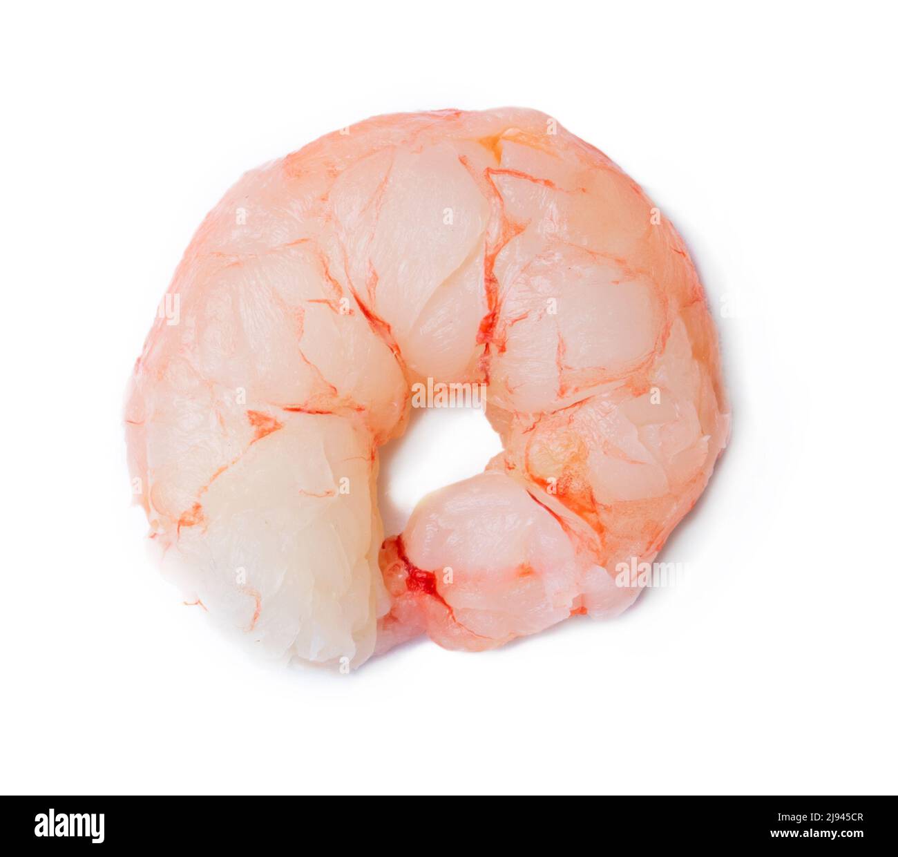 Red roound raw peeled shrimp that was frozen isolated on white Stock ...