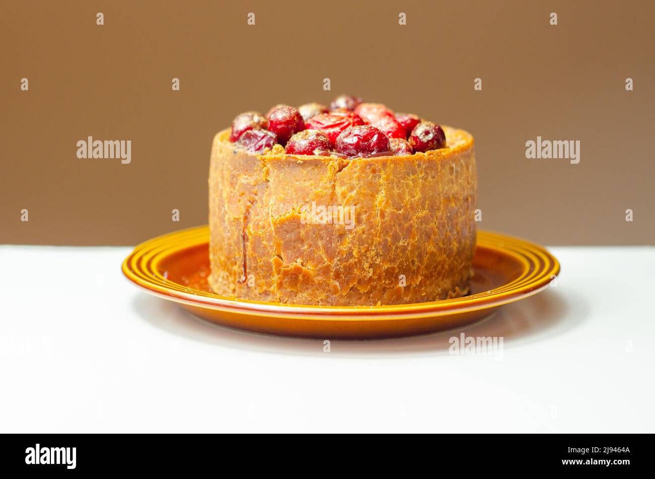 British pork pie topped with whole cranberries and a rich ruby port ...