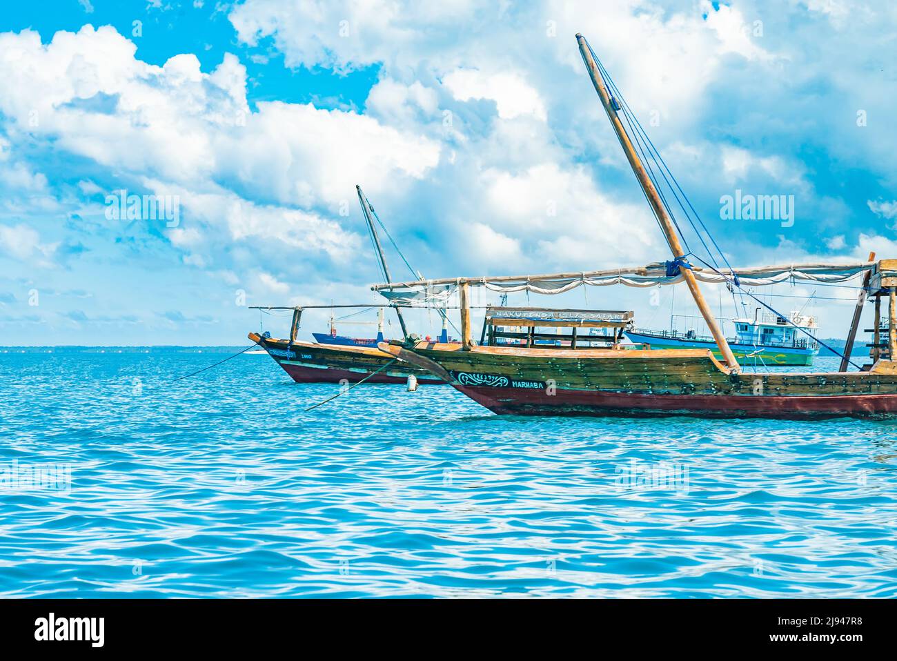 Fishing ship in water of Indian ocean. Zanzibar, Tanzania Stock Photo ...