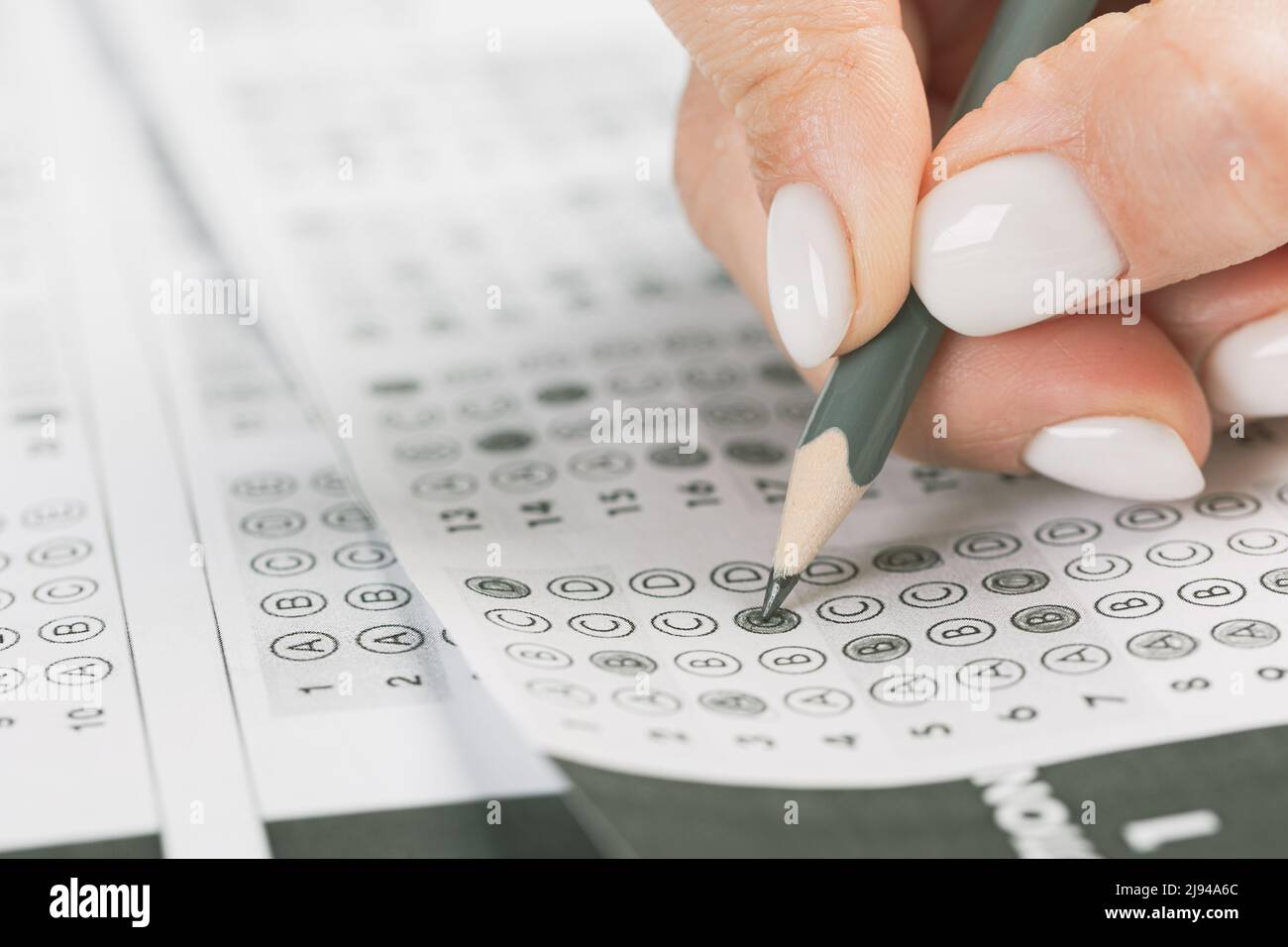 hand fill in Exam carbon paper computer sheet and pencil Stock Photo ...