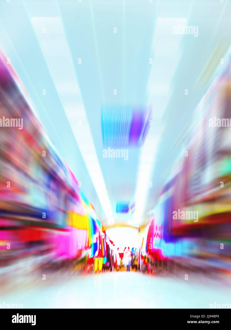 abstract blurry motion trough the clothing market Stock Photo - Alamy
