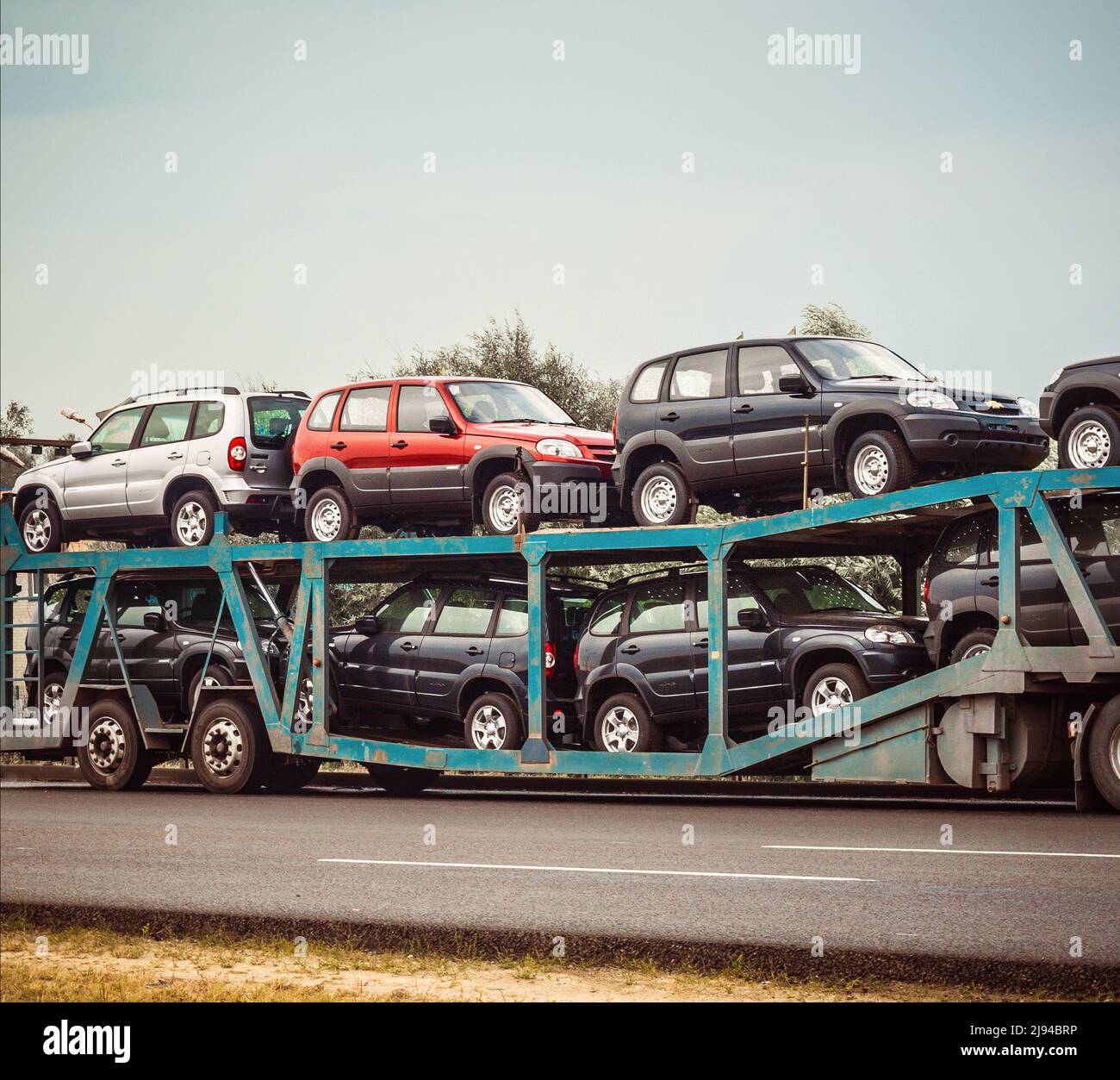 Chevrolet Niva 4x4 SUV russian new cars delivering on transporter ...