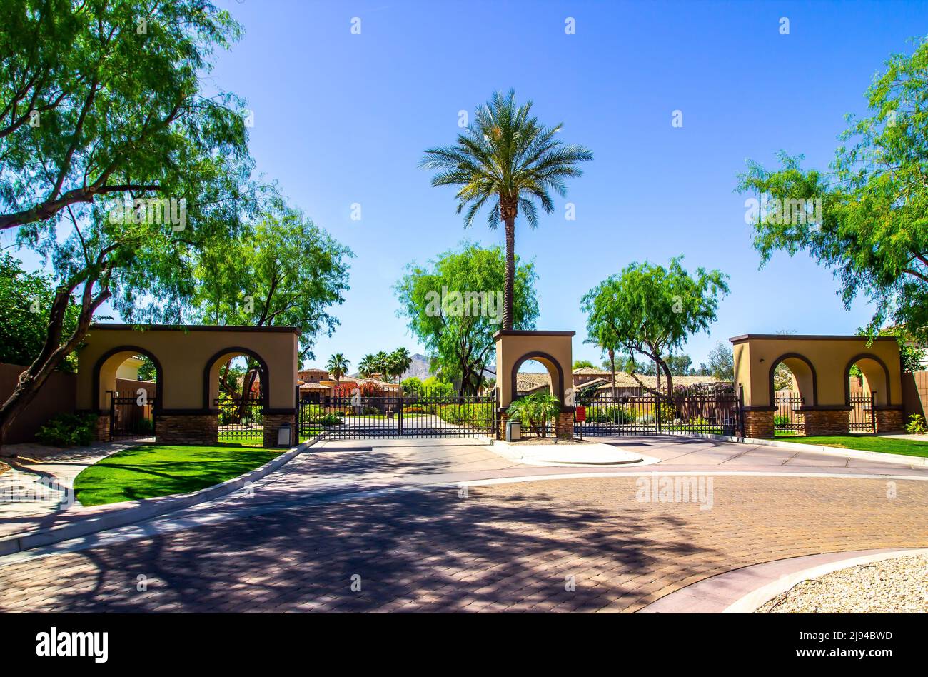 Entrance And Exit Security Gates To Housing Subdivision Stock Photo - Alamy