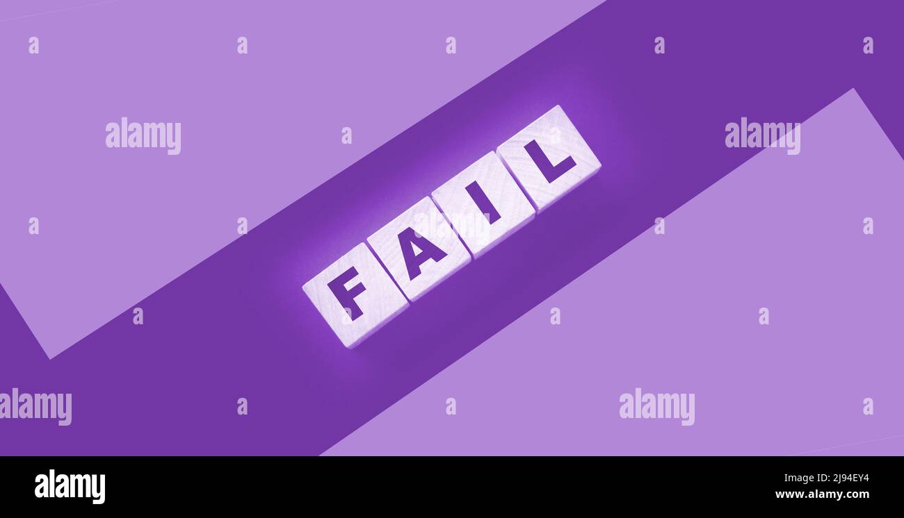FAIL Word text Written In Wooden Cube blocks on black background ...
