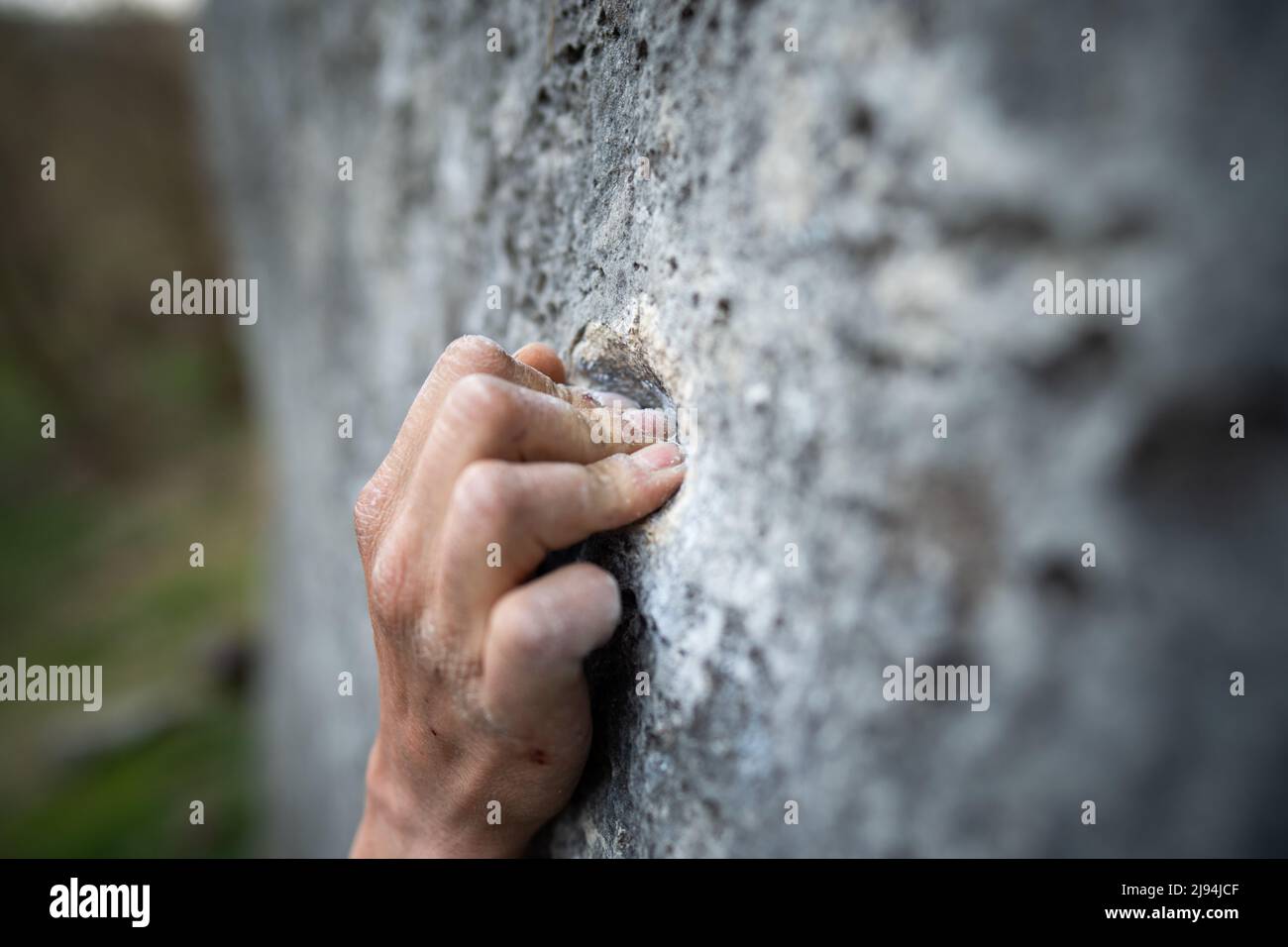 Hand holding chalk stone hi-res stock photography and images - Alamy