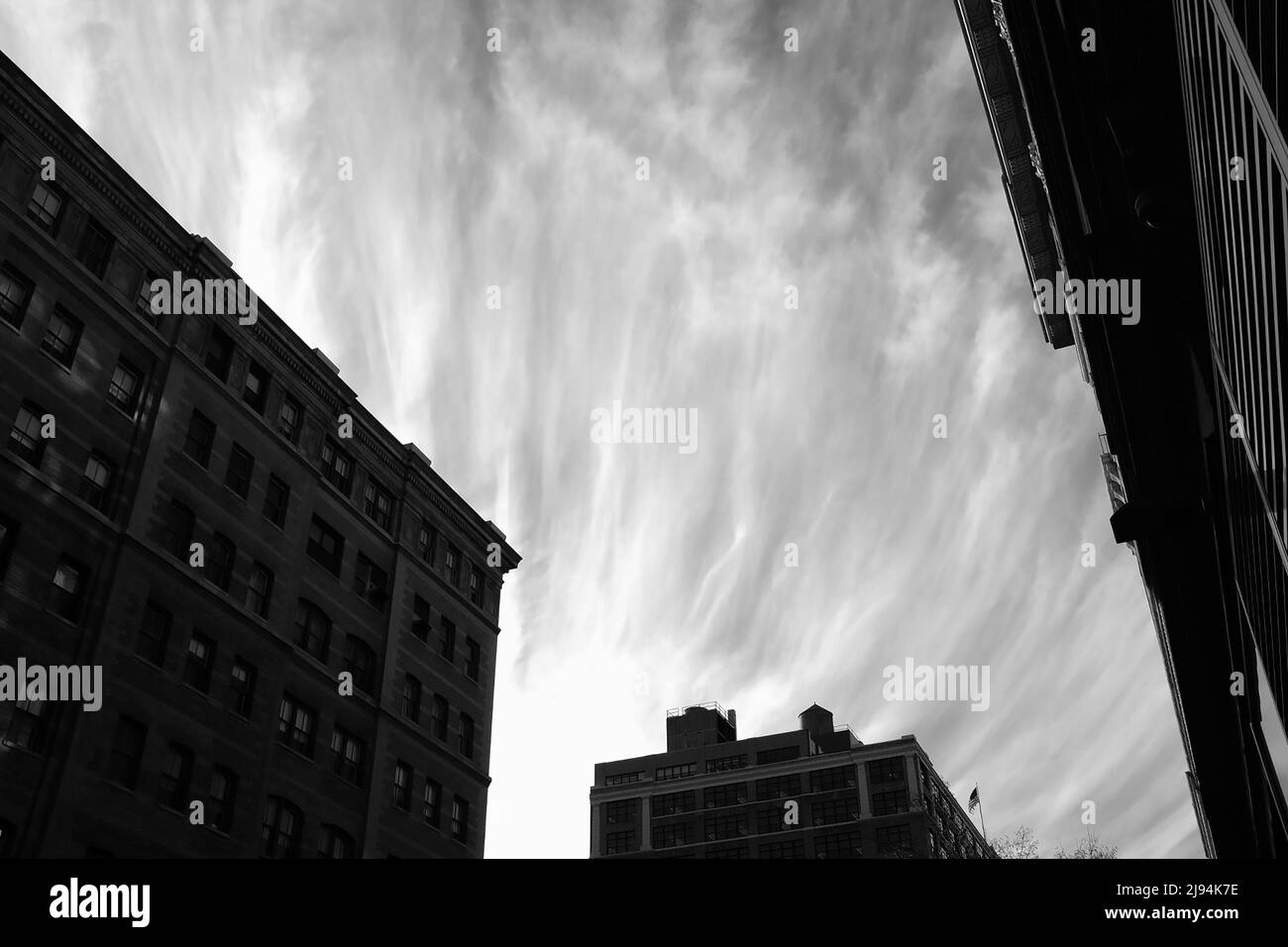 Clouds and buildings in New York City in black and white Fall Stock ...