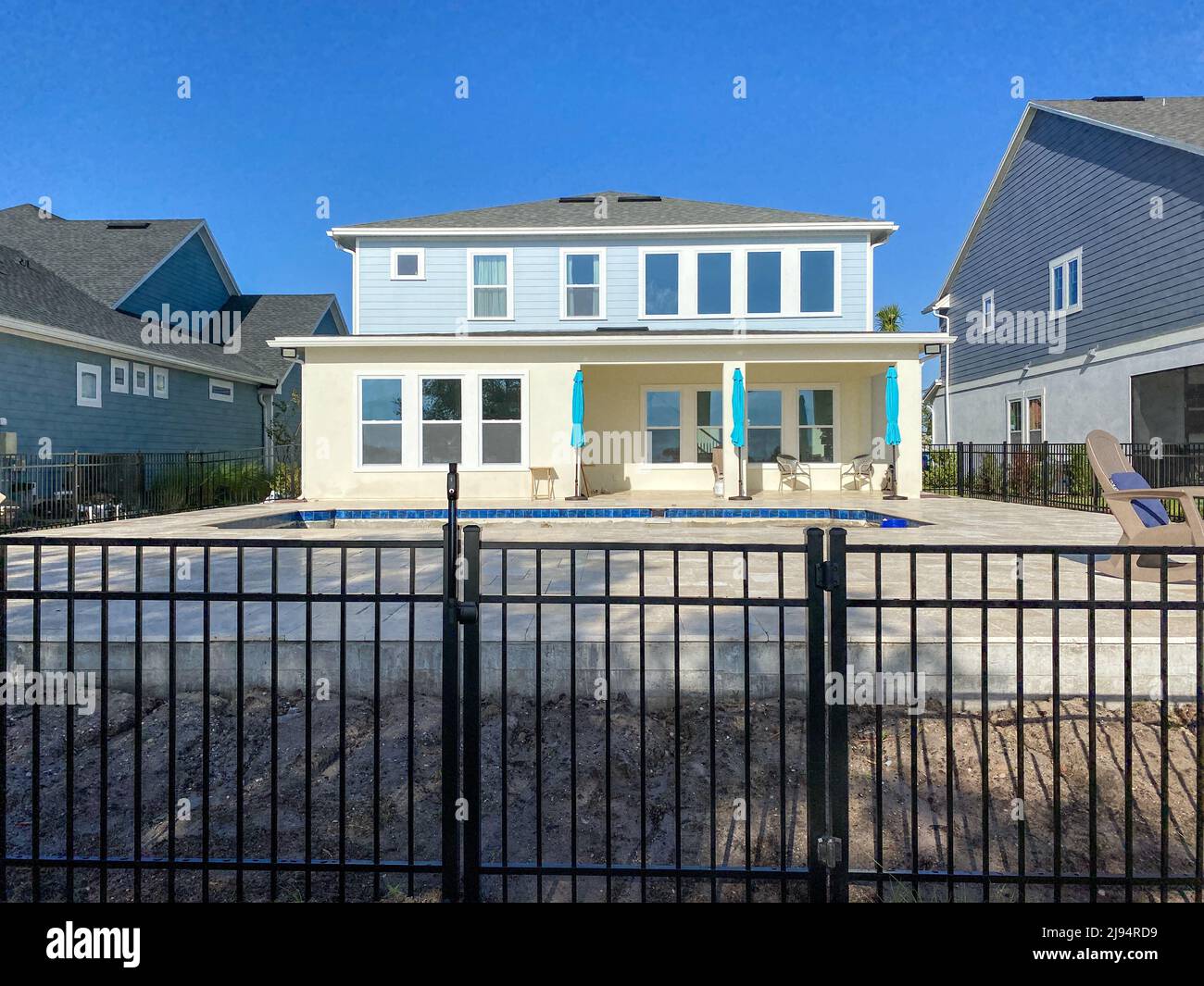 Orlando, FL/USA - October 24,2020: A swimming pool behind a house in ...