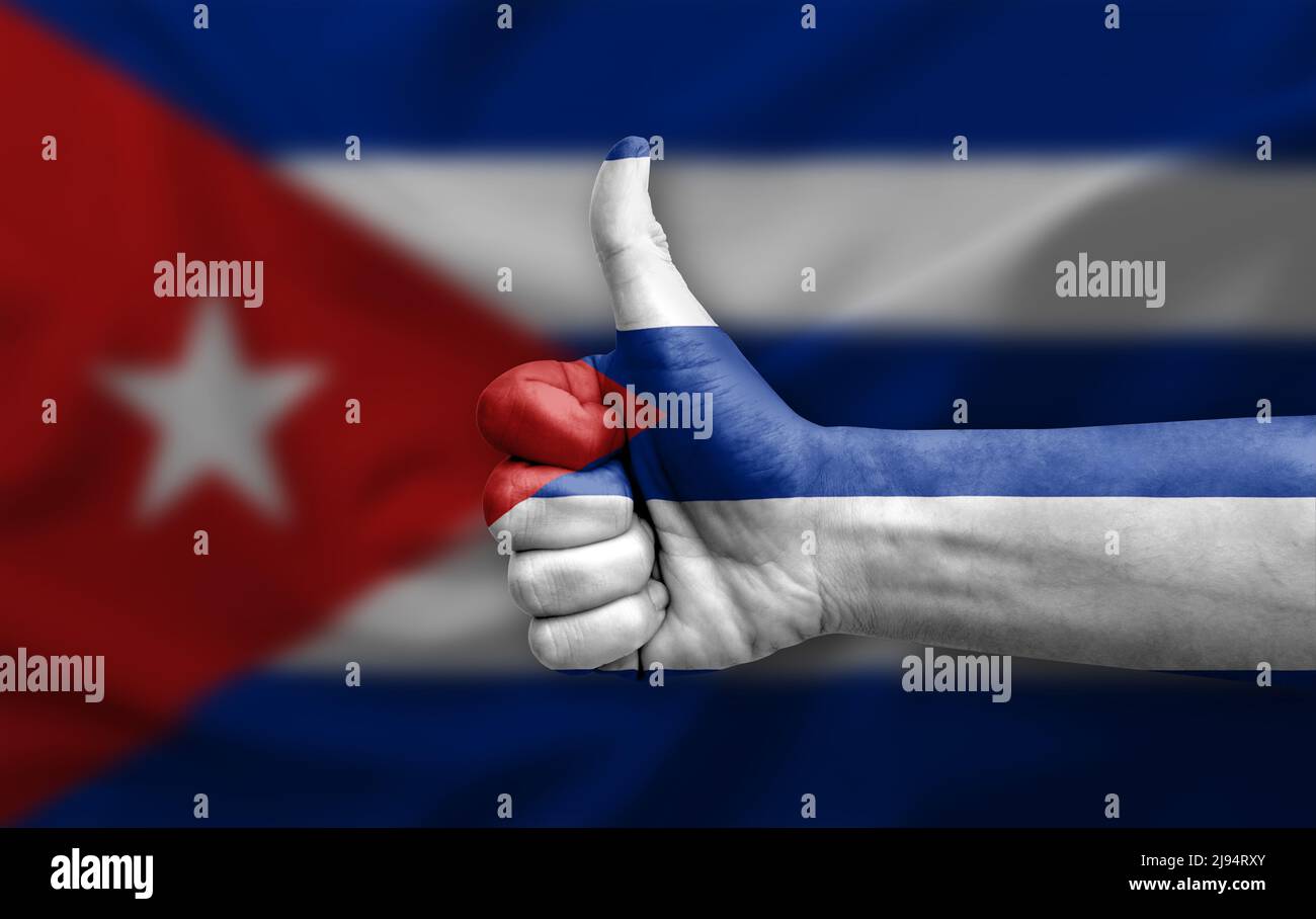 Hand making thumb up painted with flag of cuba Stock Photo - Alamy