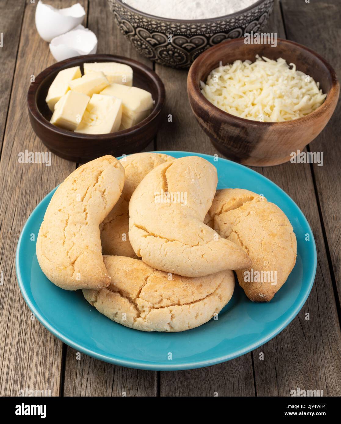 Chipas, typical south american cheese bun over wooden table with ...