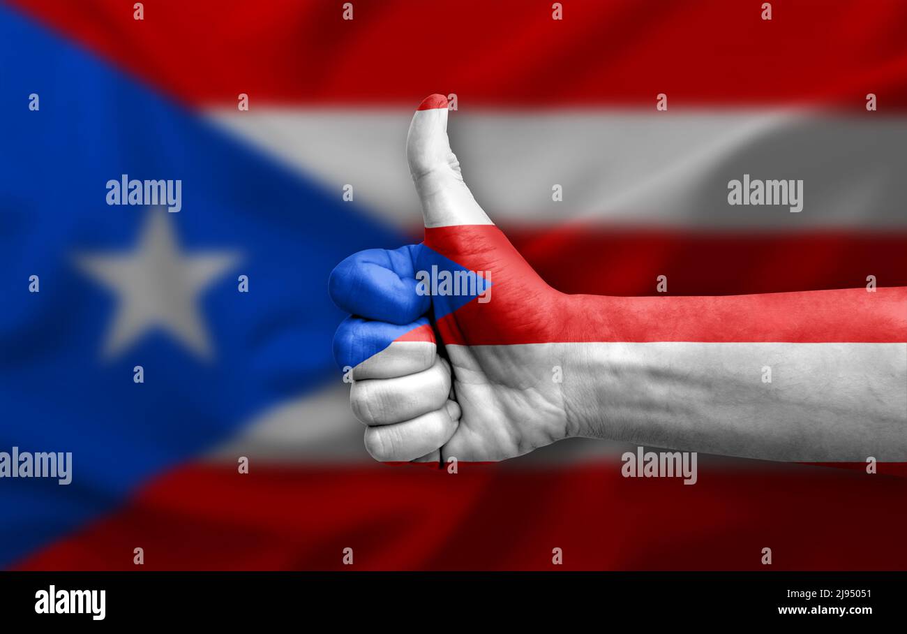 Puerto rico flag hand hi-res stock photography and images - Alamy