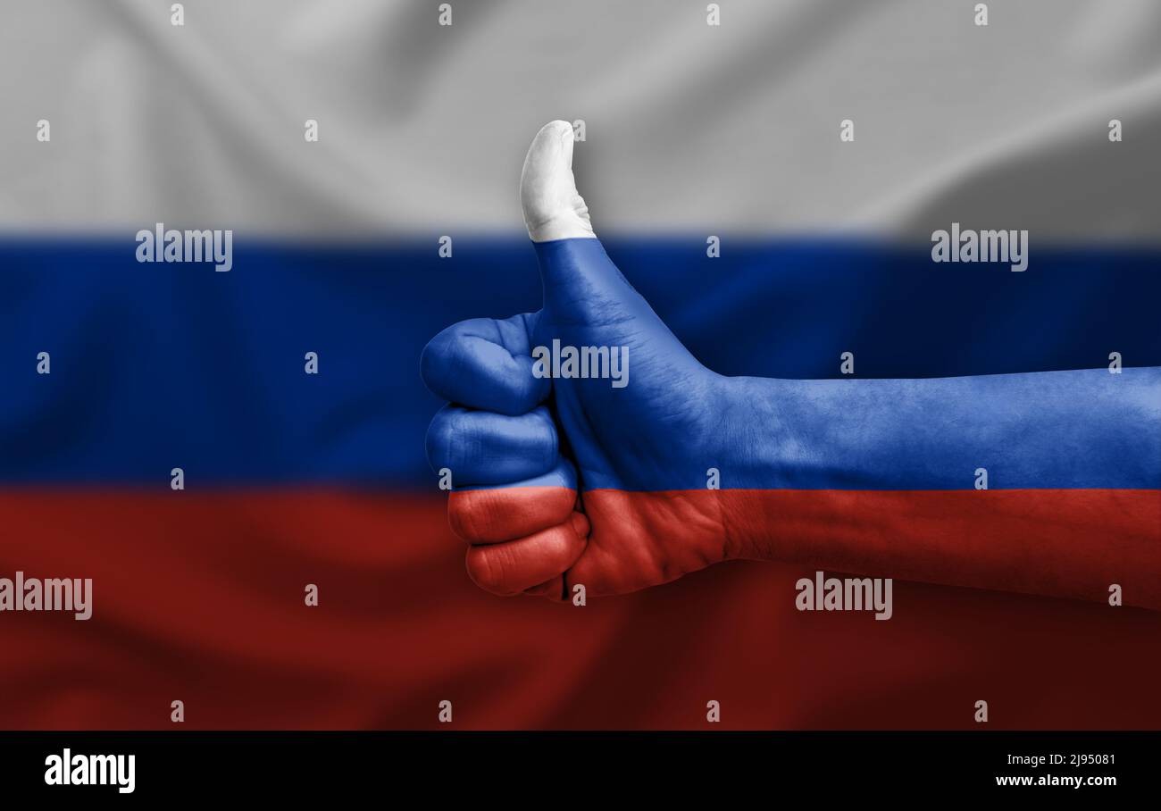 Hand making thumb up painted with flag of russia Stock Photo - Alamy