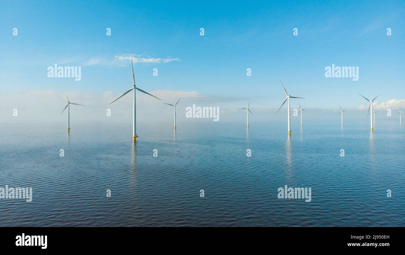 Windmill farm in the ocean Westermeerwind park, windmills isolated at ...