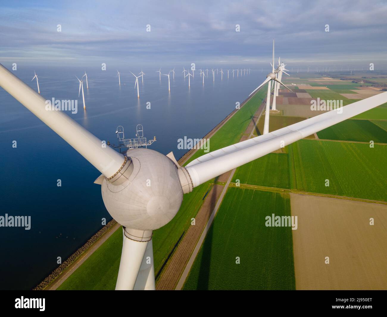 Windmill farm in the ocean Westermeerwind park, windmills isolated at ...