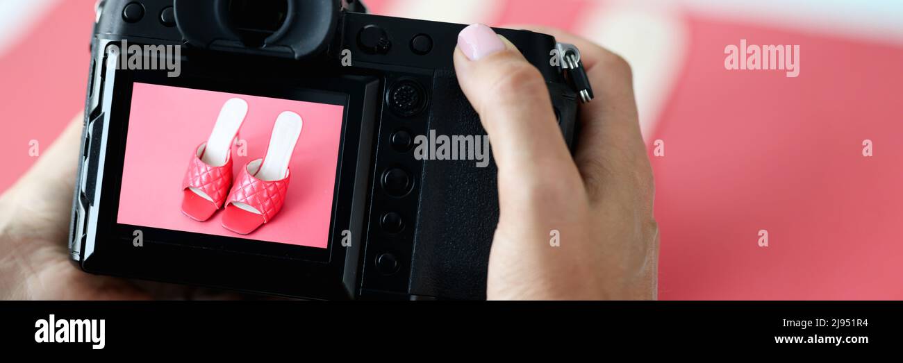 Womens summer shoes on the camera screen Stock Photo - Alamy