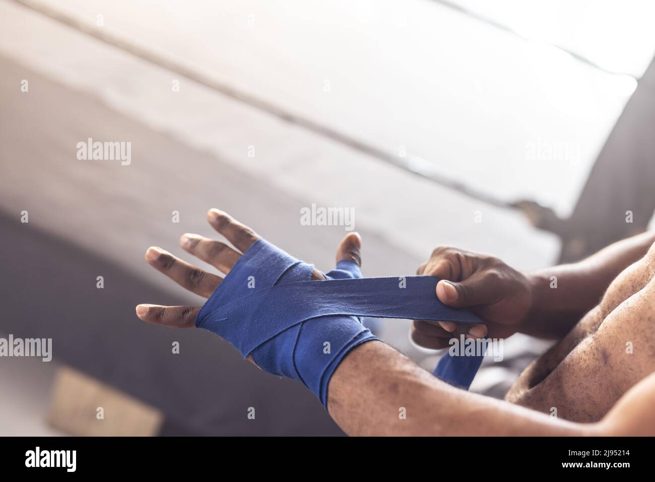 Boxer wrapping hands african american hi-res stock photography and ...