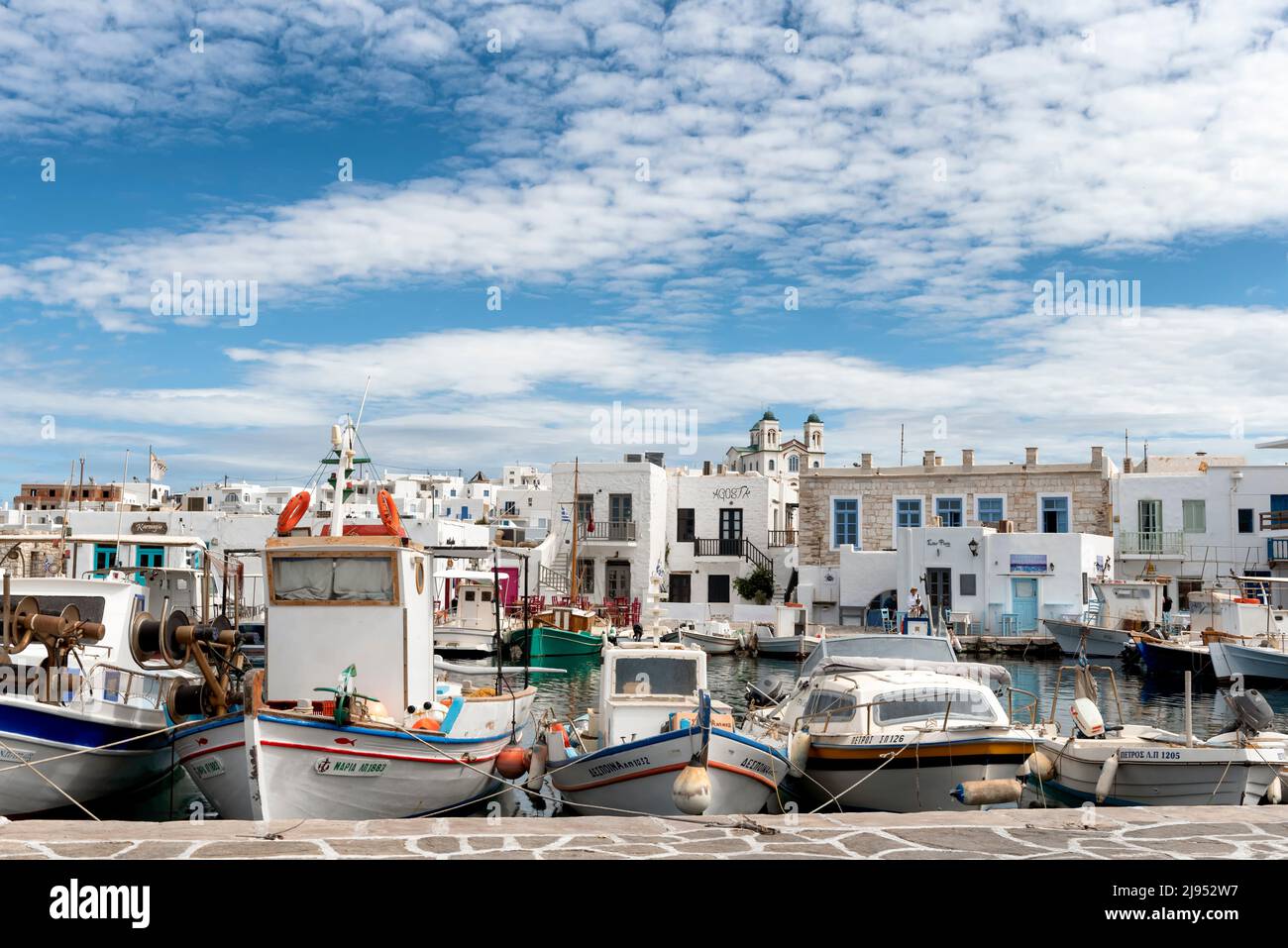 View of village of Naousa with fishing boats in the foreground Stock ...