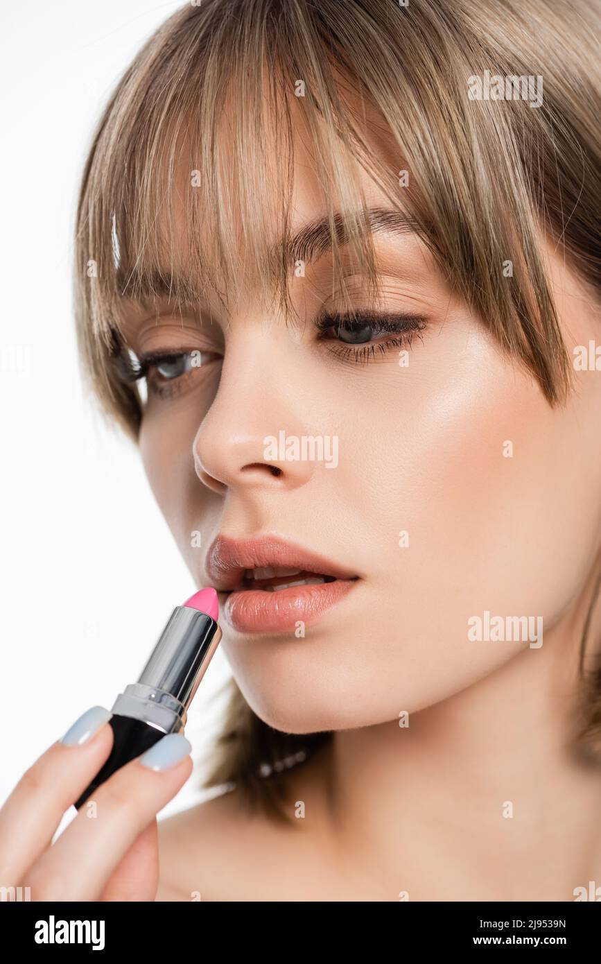 Beautiful woman applying highlighter hi-res stock photography and ...