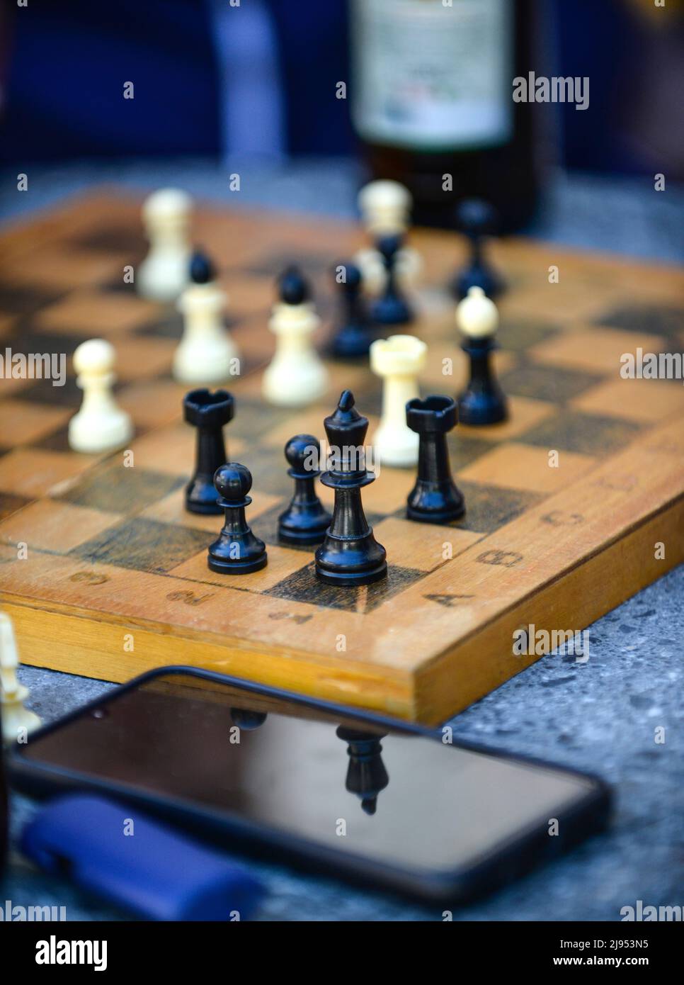 playing chess , reflection on a smartphone display Stock Photo - Alamy