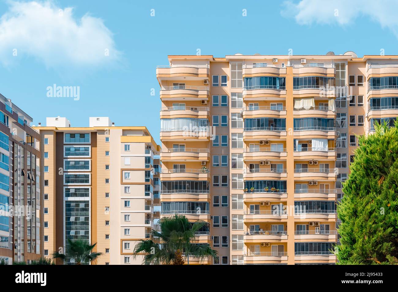 Fragments of the facades of modern multi-storey residential buildings ...