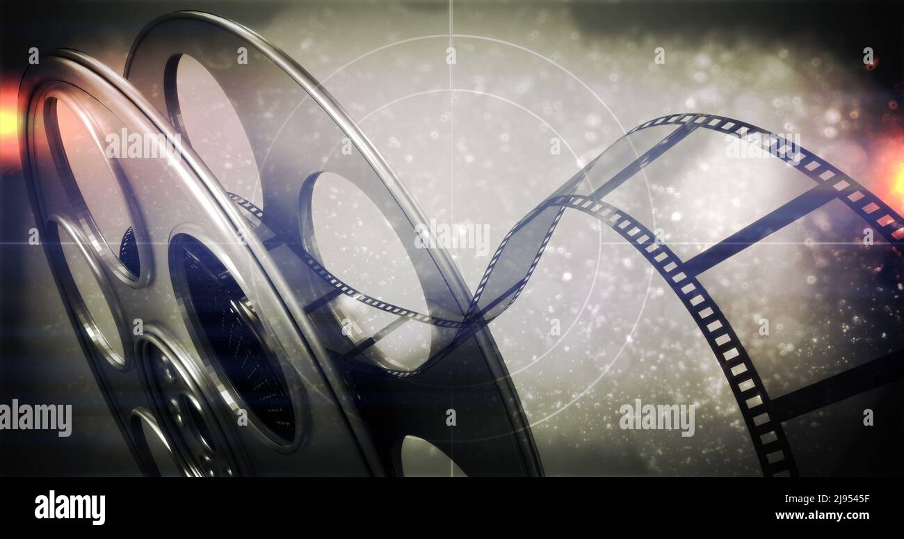 Film rolling out of a film reel Stock Photo - Alamy