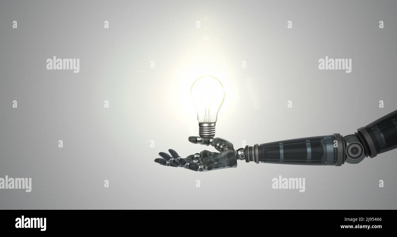 Robotic hand presenting illuminated bulb against white background Stock ...