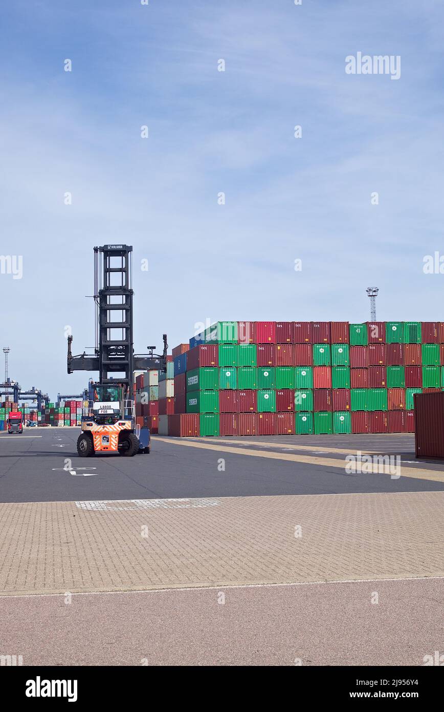 Container handler in dockside container yard at the Port of Felixstowe ...